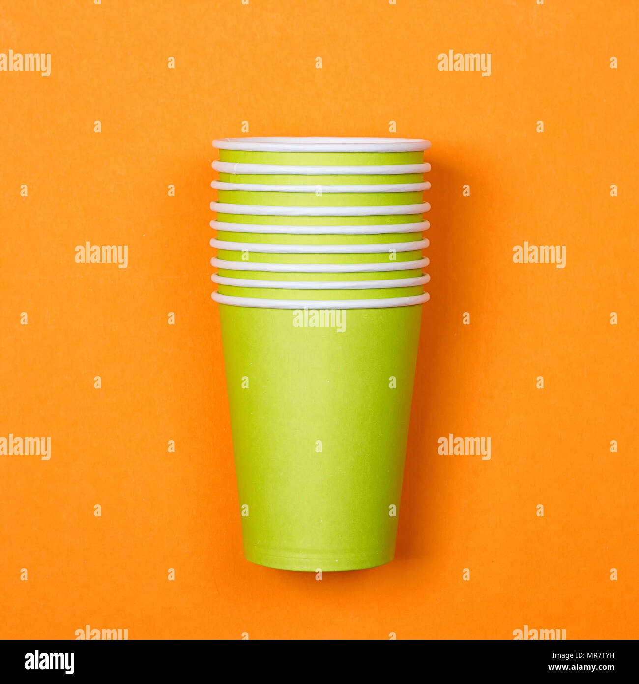 recycling colorful paper glass on the orange background Stock Photo - Alamy