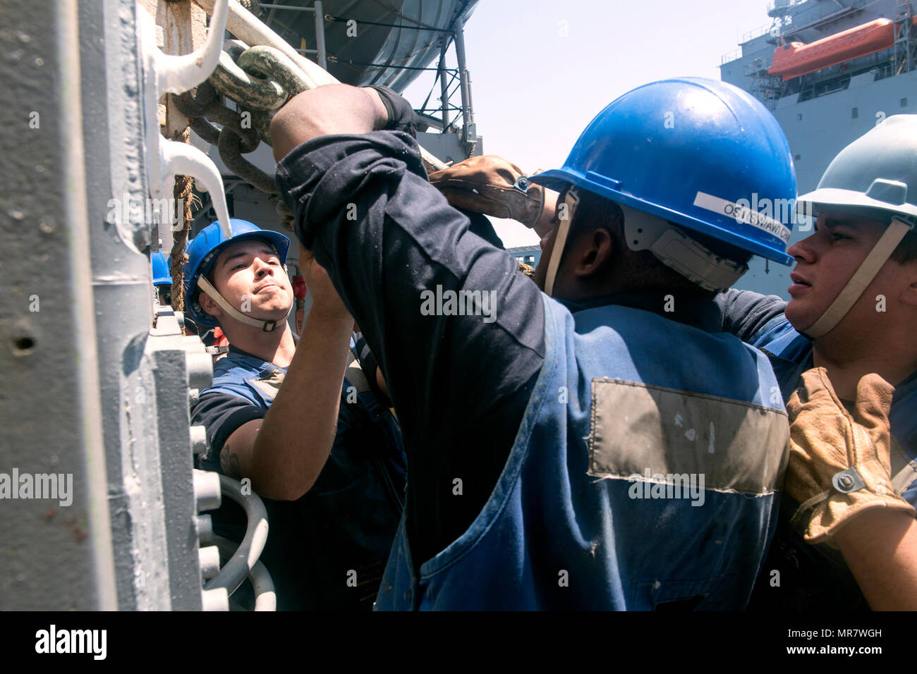 170519-N-FT178-079 WESTERN PACIFIC (May 19, 2017) Sailors attach a span ...