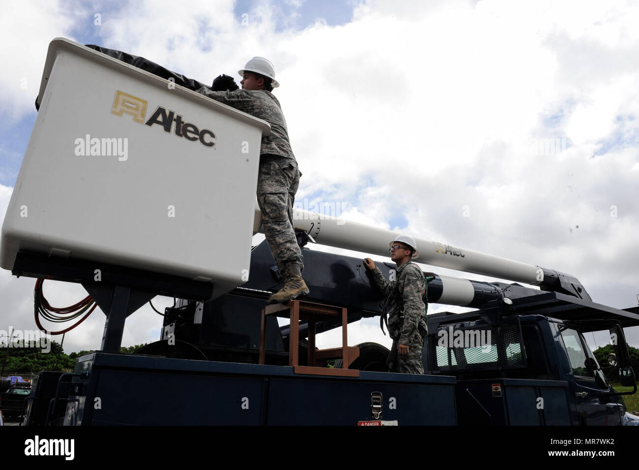 U.S. Air Force Airmen from the 18th Civil Engineer Squadron prepare a ...