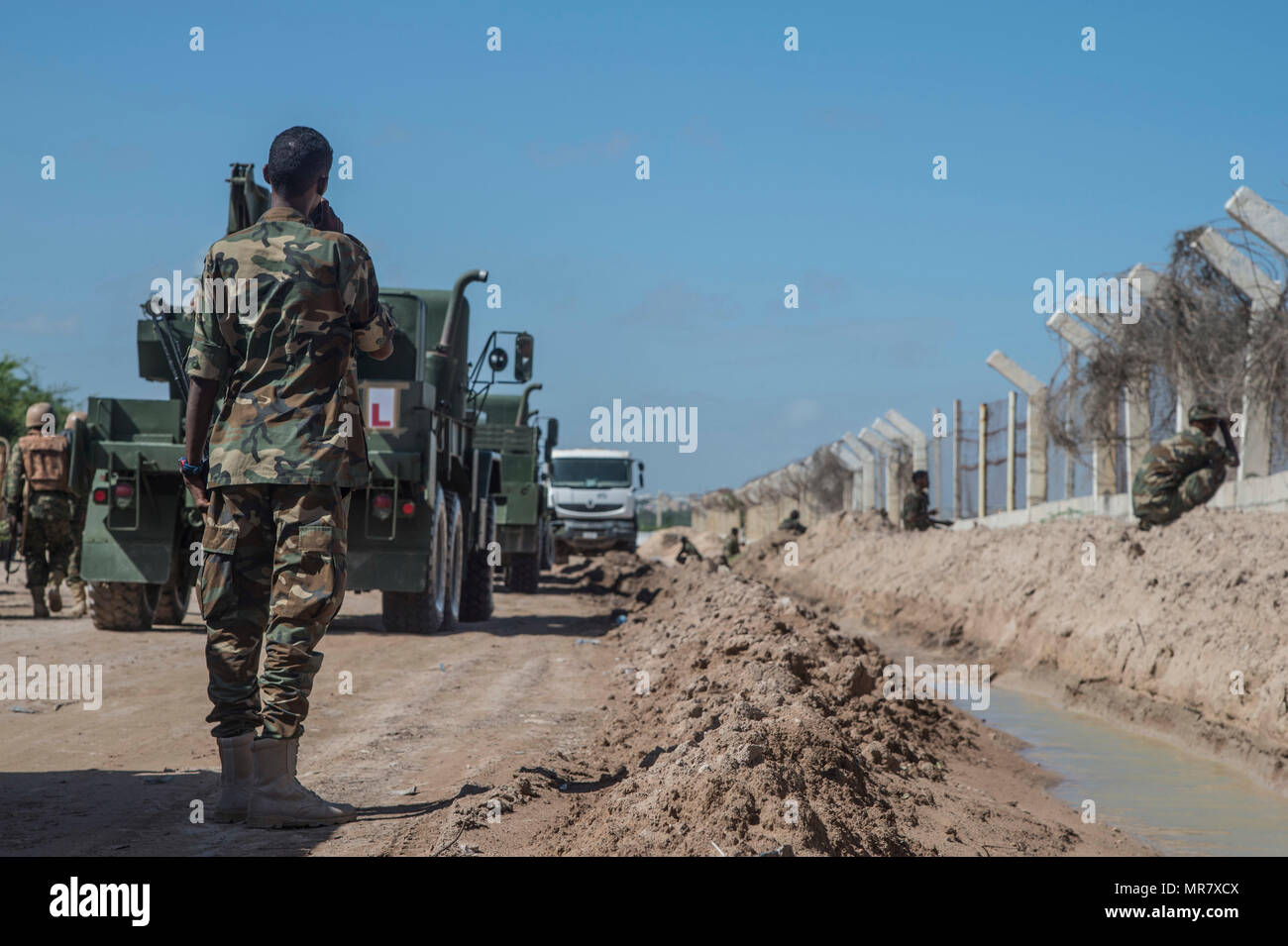 Somali National Army soldiers of the Danab battalion conduct convoy ...