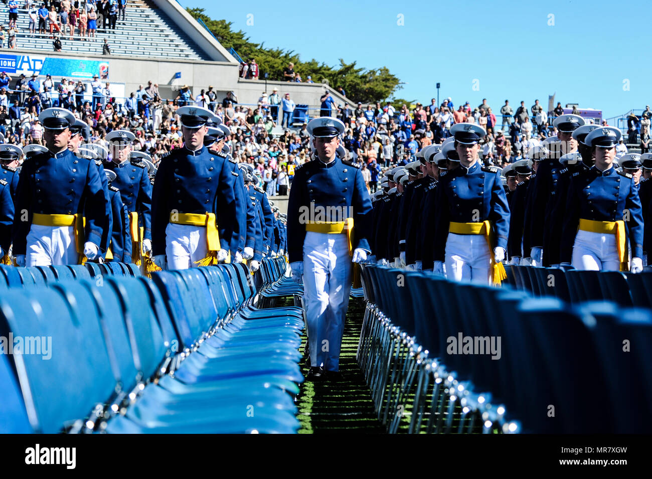 Graduates march to their seats during the graduation ceremony at the ...