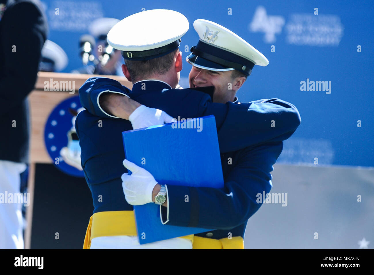 Graduates celebrate after receiving their diploma during a ceremony at ...