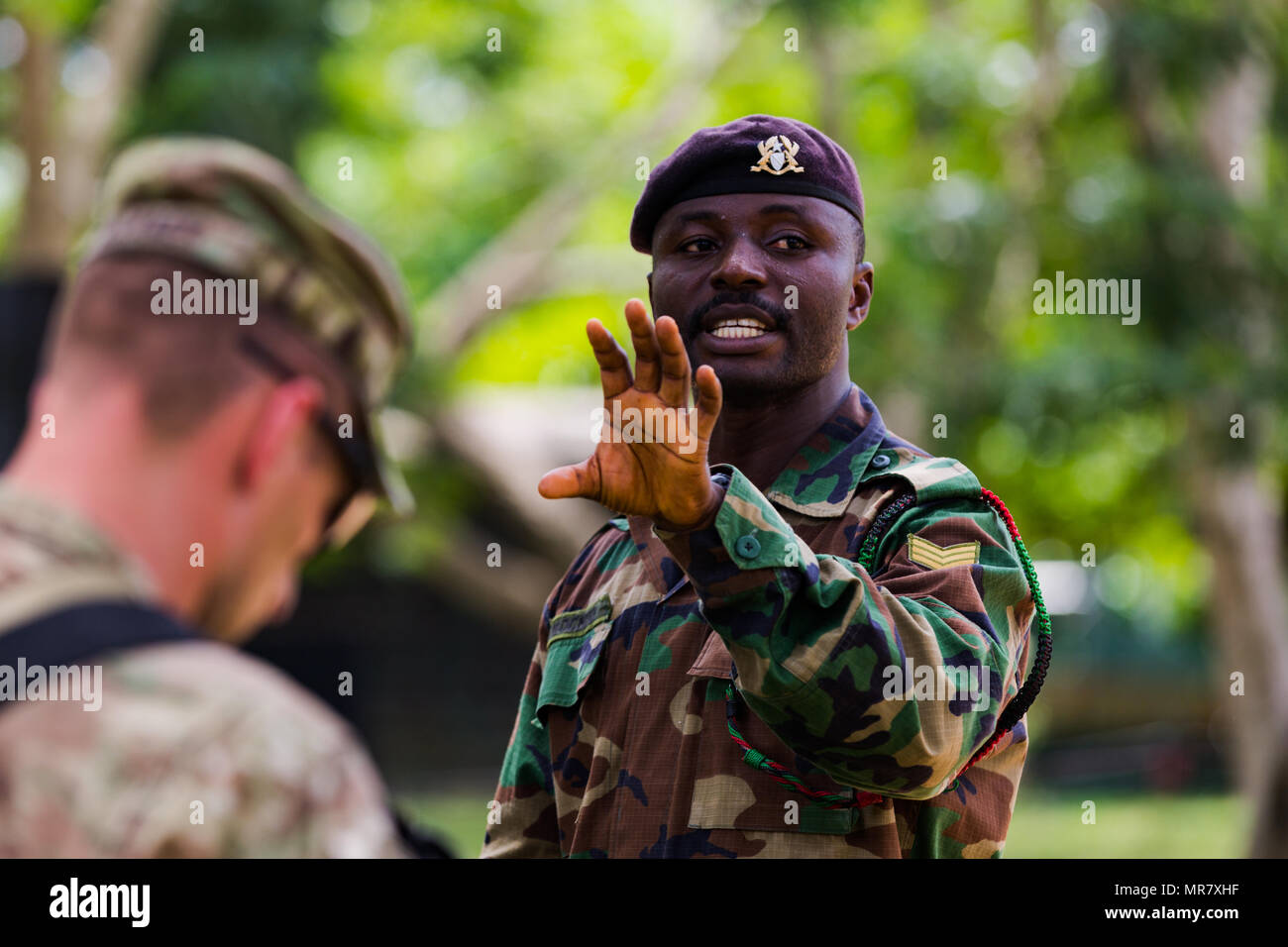 Ghanaian Armed Forces Sgt. Et Mochiam teaches raid drill formations ...