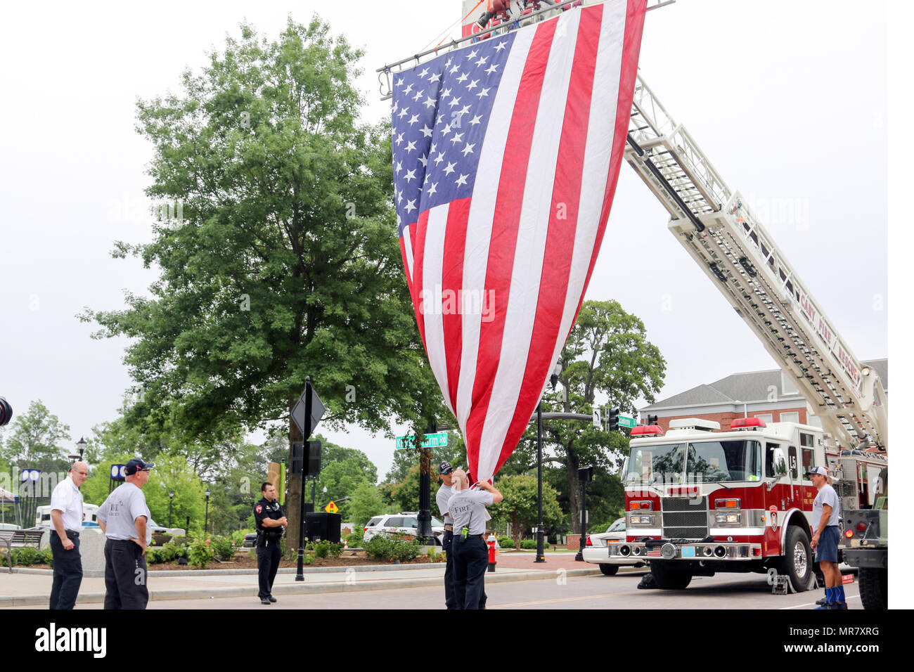 Firefighters in Cary, North Carolina raised the American flag using a ...