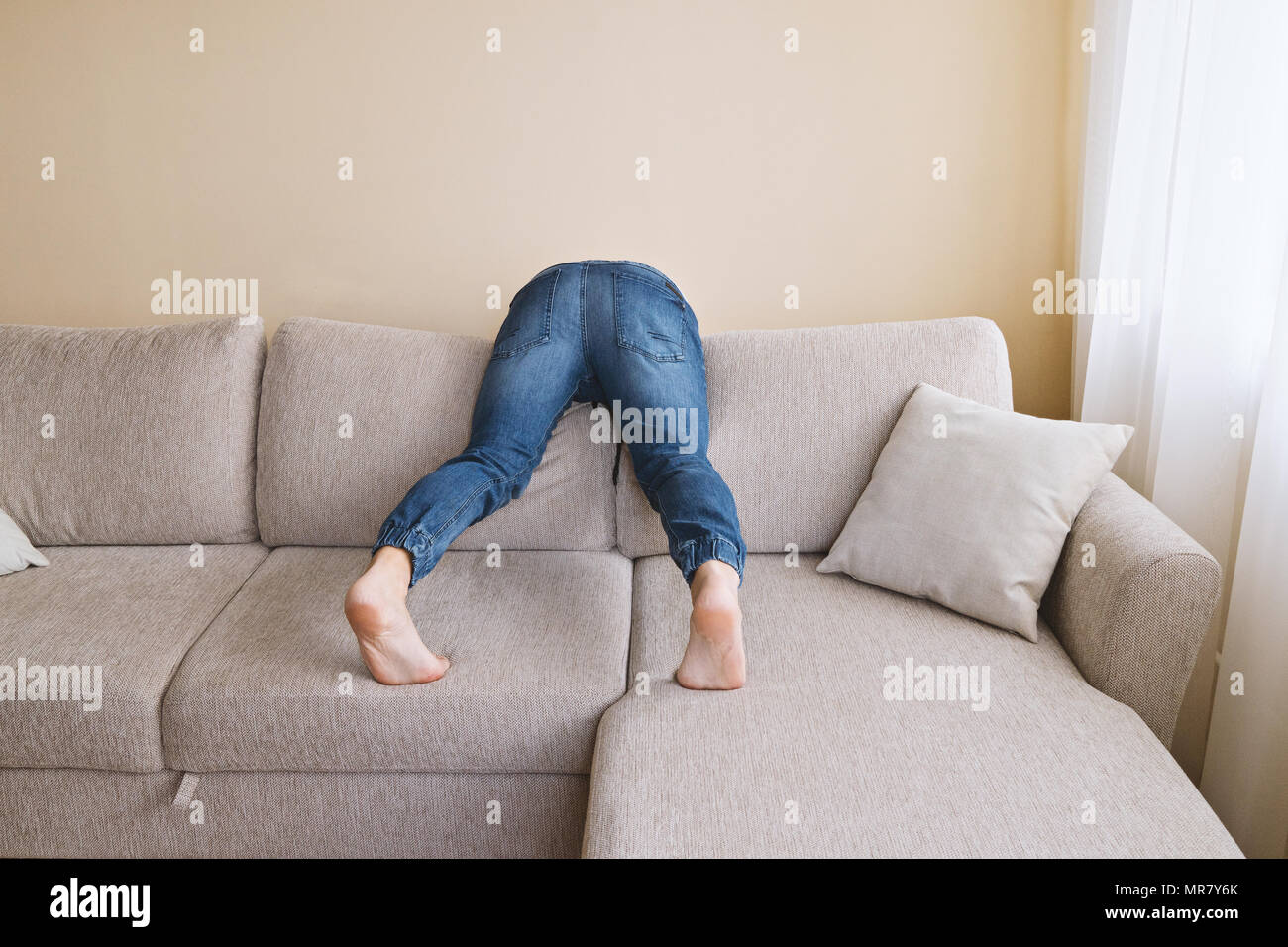 Cleaning behind furniture hi-res stock photography and images - Alamy