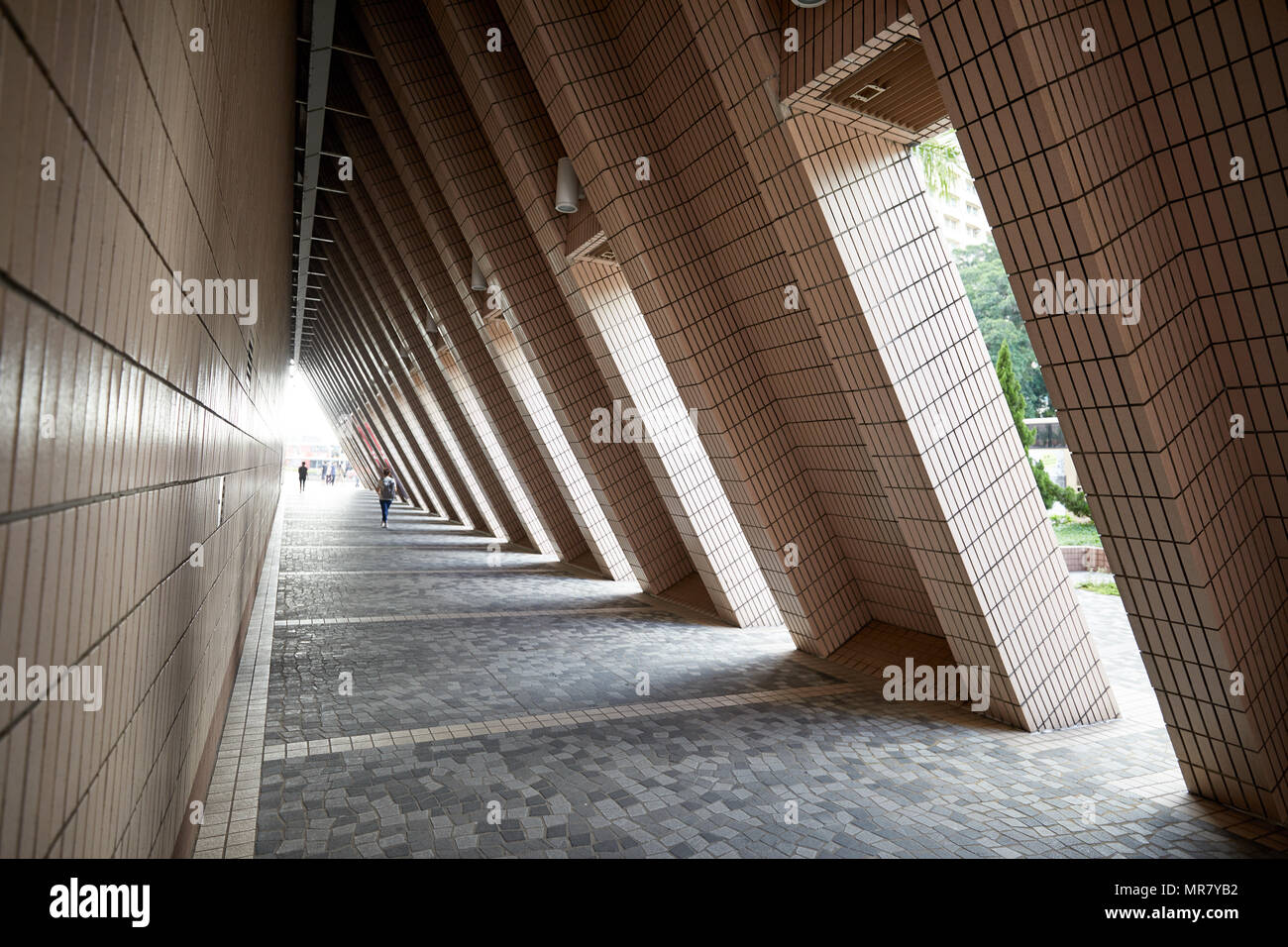 View of a covered walkway around the Hong Kong Cultural Centre, located ...