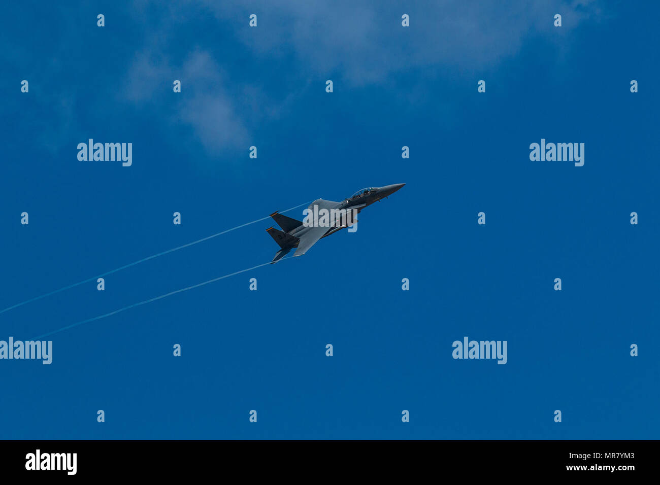 An F-15 Strike Eagle flies overhead during the All American Week 100 ...