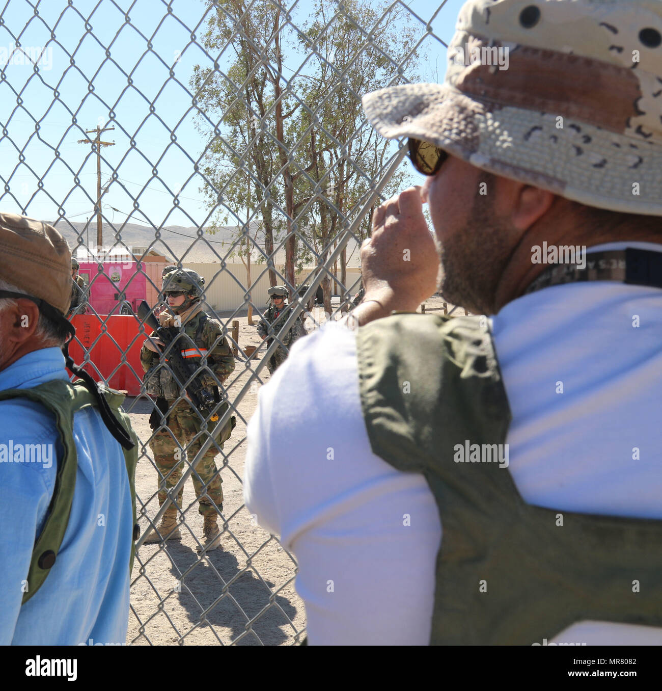 Role-players simulate a demonstration during 155th Armored Brigade ...