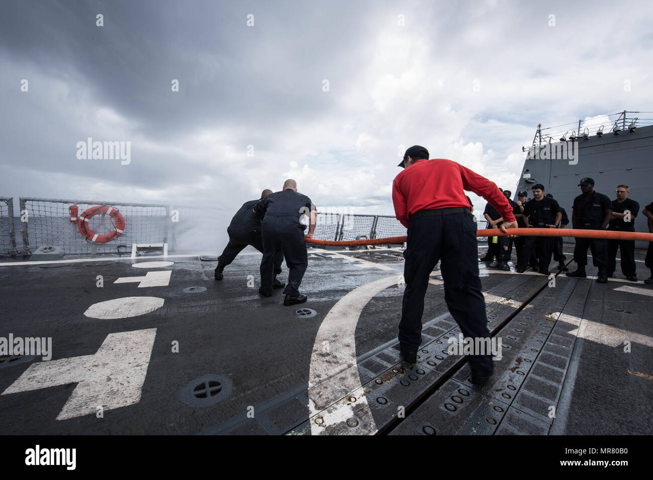Fire hose handling techniques hi-res stock photography and images - Alamy