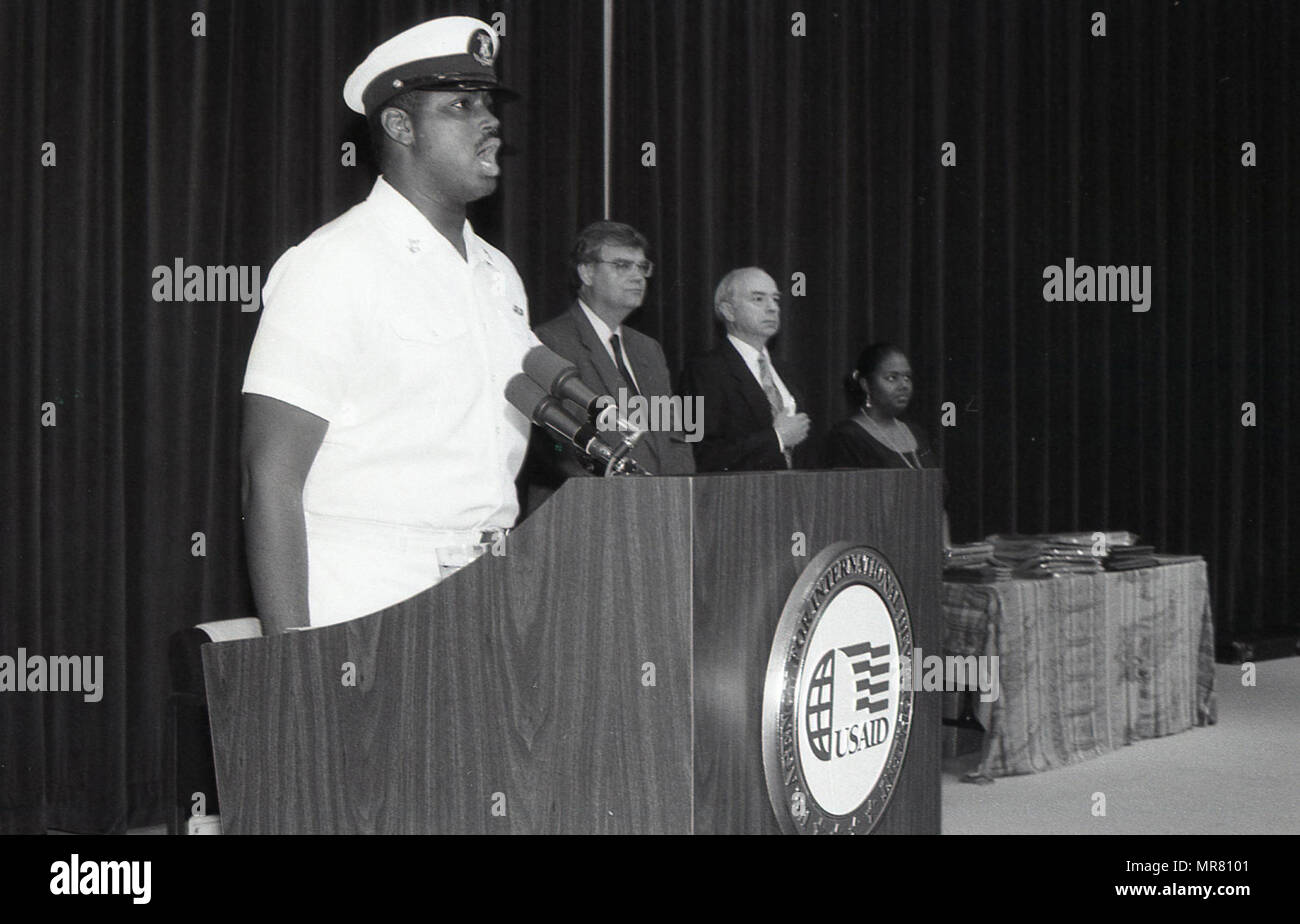 Admin. Atwood presenting general awards - Official speaking at podium ...