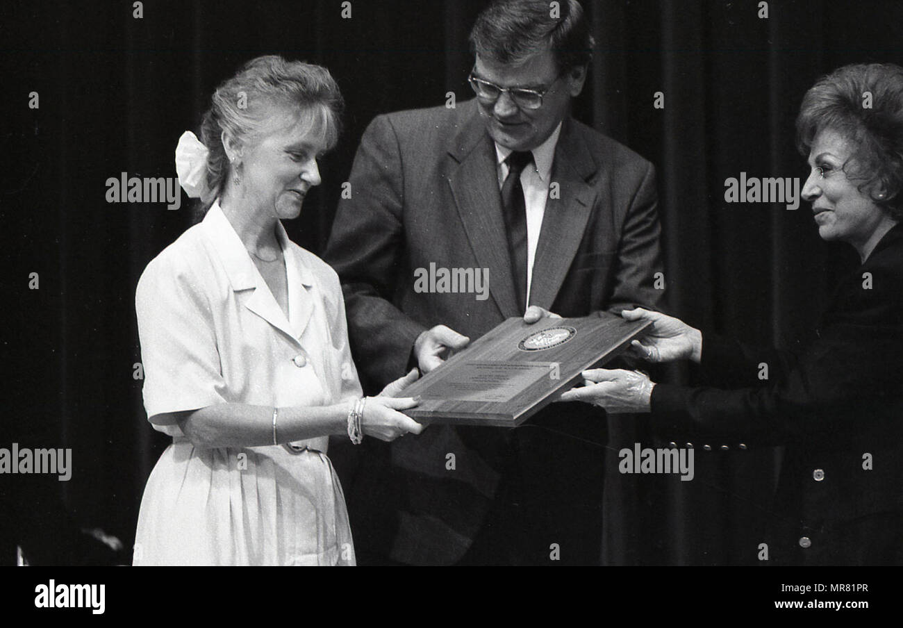Admin. Atwood presenting general awards - Woman receiving award on ...