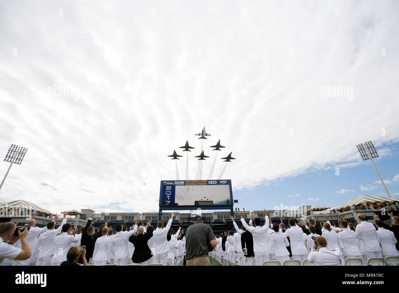 The U.S. Navy Blue Angels fly over the graduation and commissioning ...