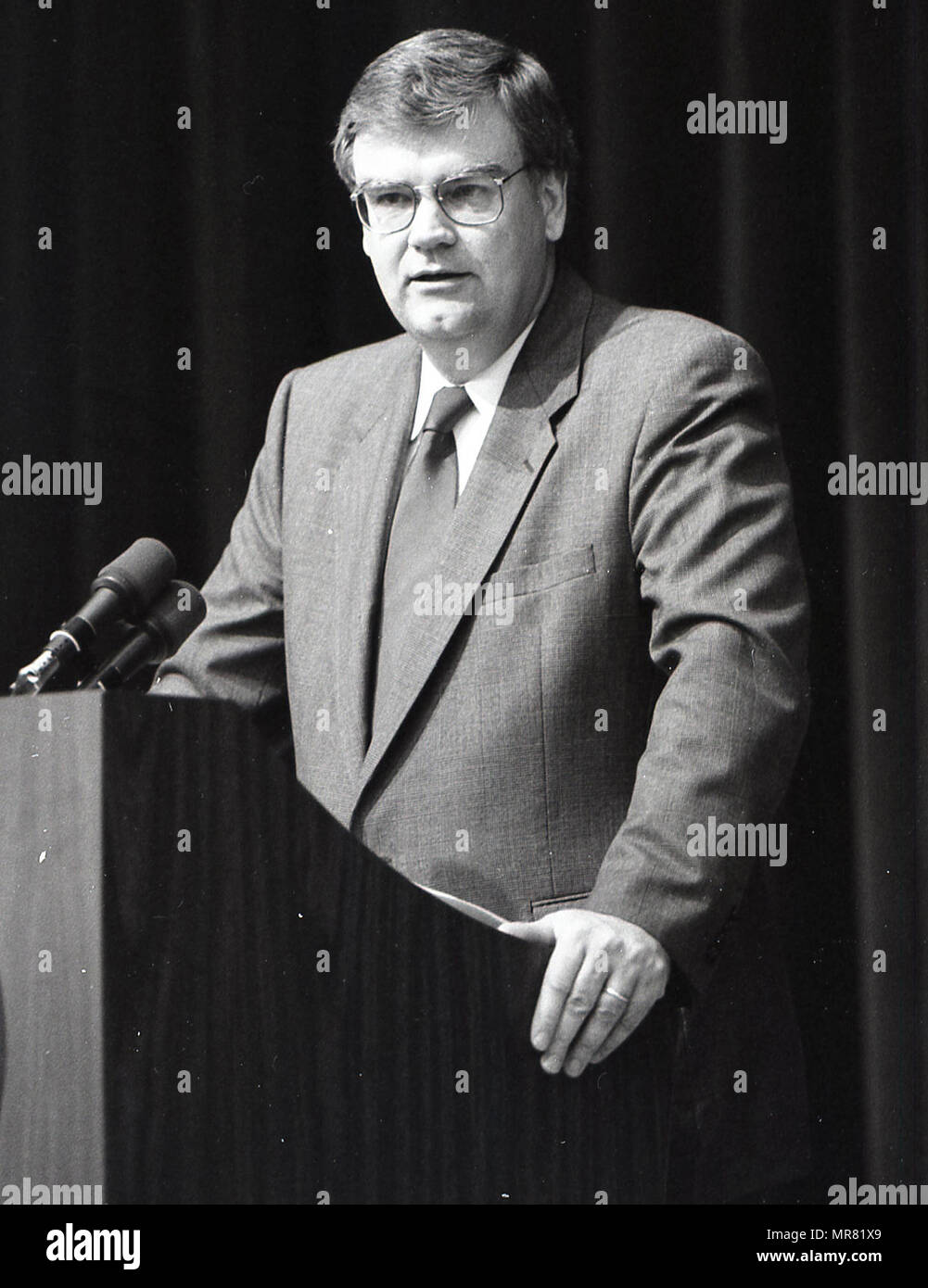 Admin. Atwood presenting general awards - Man speaking at podium Stock ...