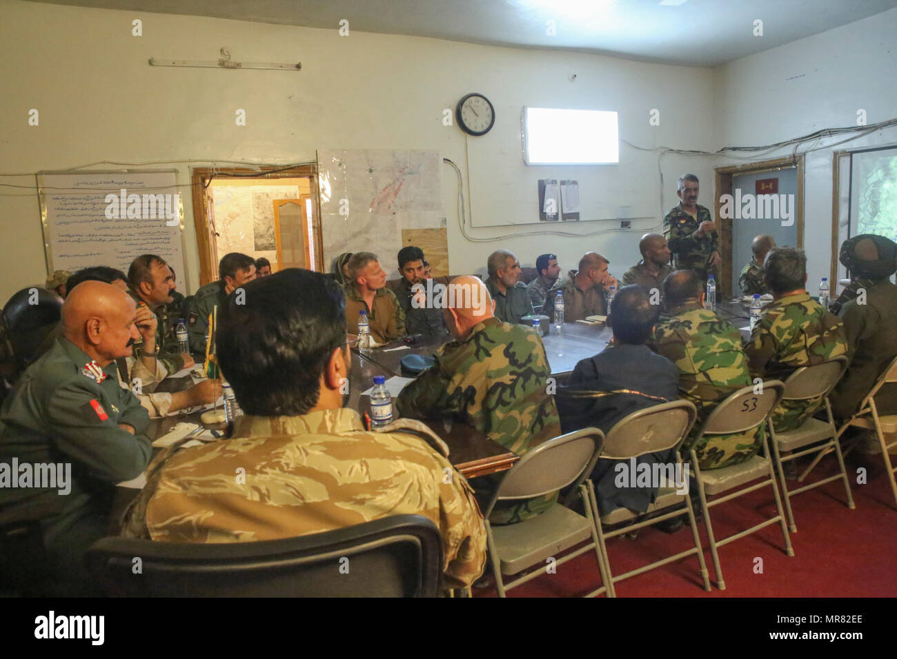 Afghan National Army Col. Abdul Waheid Tamurei, right, the commanding ...