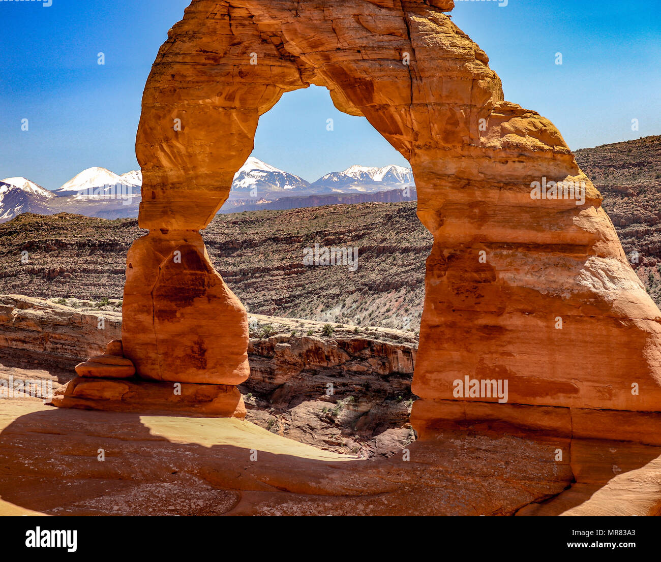 Utah's icon the Delicate Arch shows a gateway to the snow capped ...
