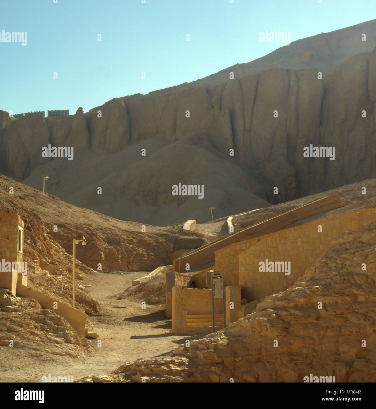 farmers working in a collective farm in China, hold a large poster of ...