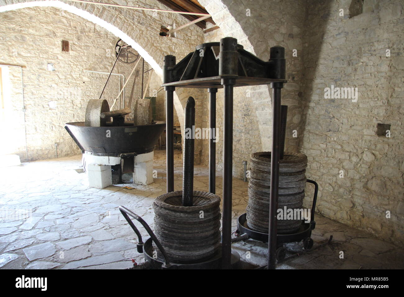 Ancient olive oil production machinery Stock Photo - Alamy