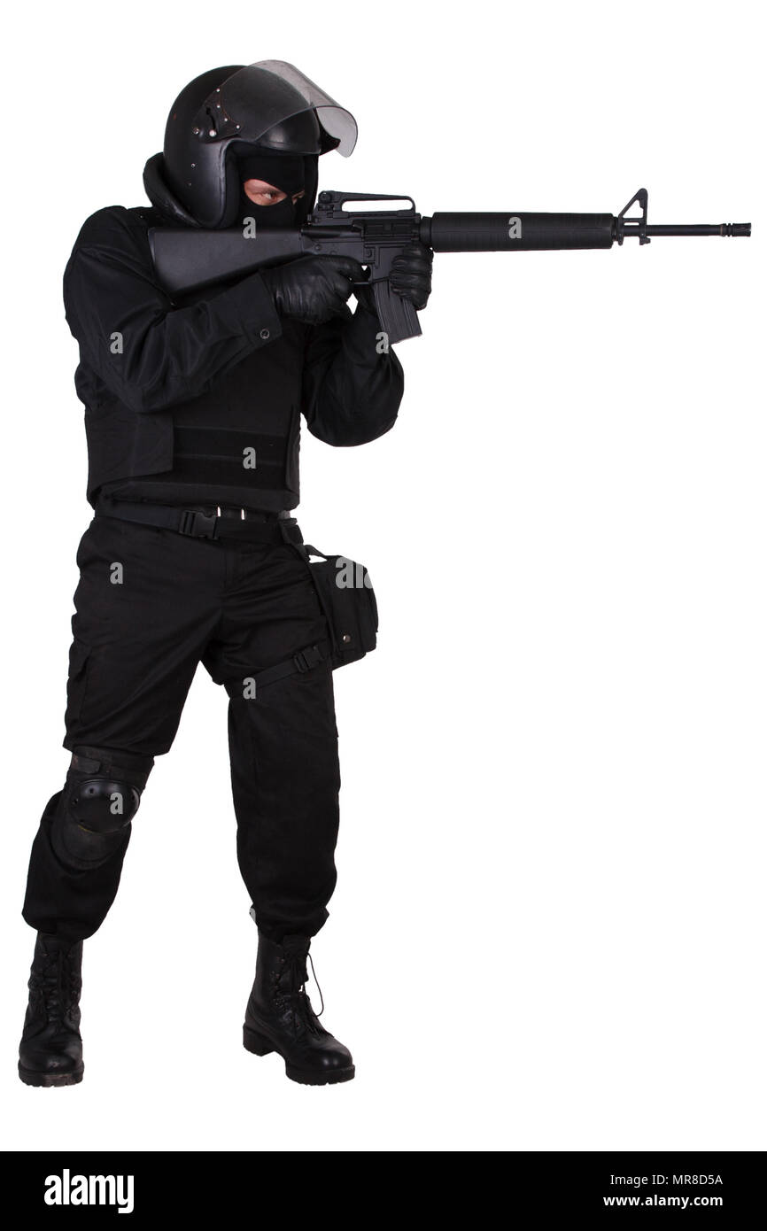 SWAT officer with assault rifle in black uniform isolated on white ...