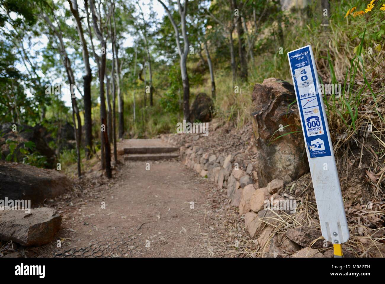 Cudtheringa track milestone distance walked sign signage hi-res stock ...