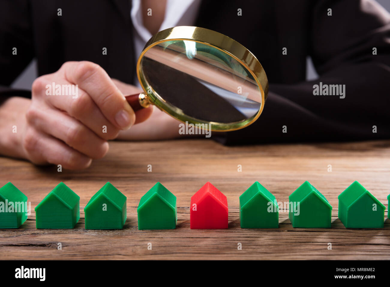 Asset holding hi-res stock photography and images - Alamy