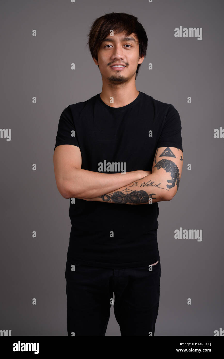 Asian man smiling portrait hi-res stock photography and images - Alamy