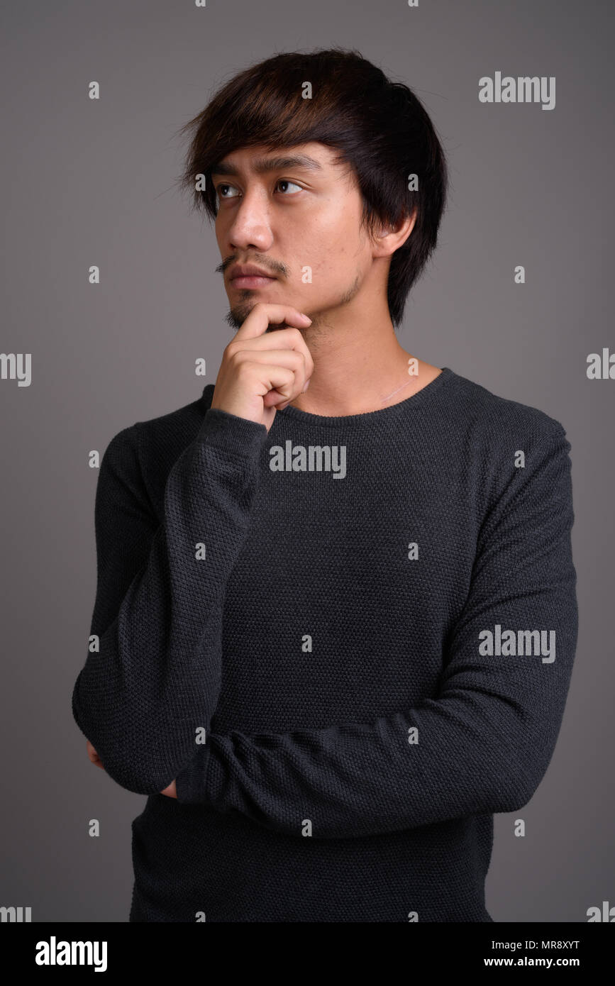 Hand asian young man hi-res stock photography and images - Alamy