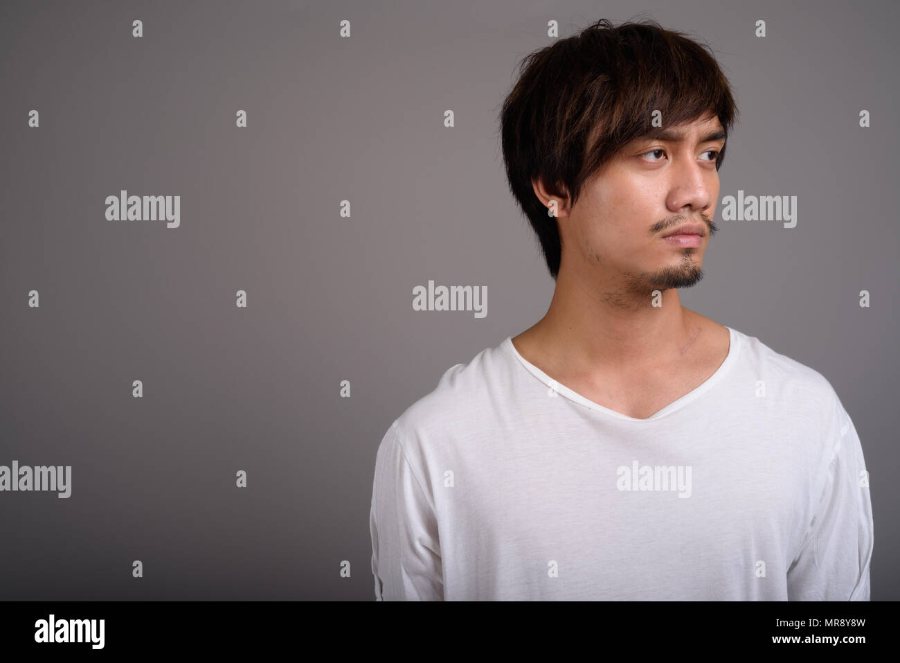 Asian male face close up hi-res stock photography and images - Alamy