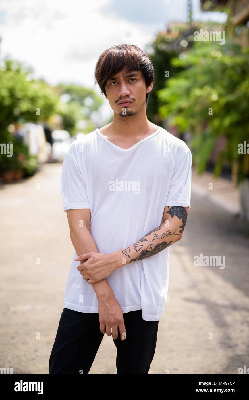 Asian man tattoos hi-res stock photography and images - Alamy