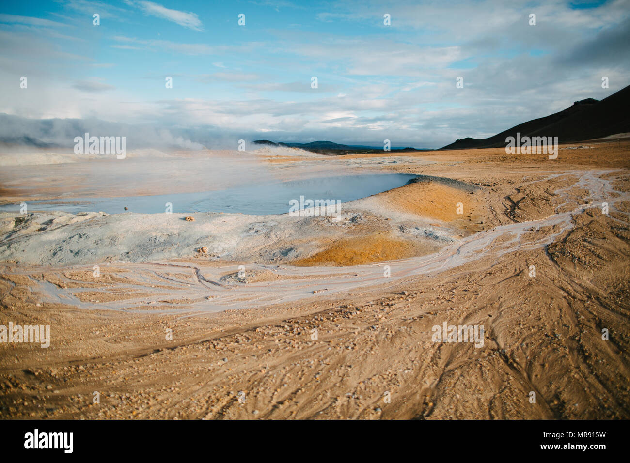 beautiful volcanic lake and steam from hot springs in iceland Stock ...