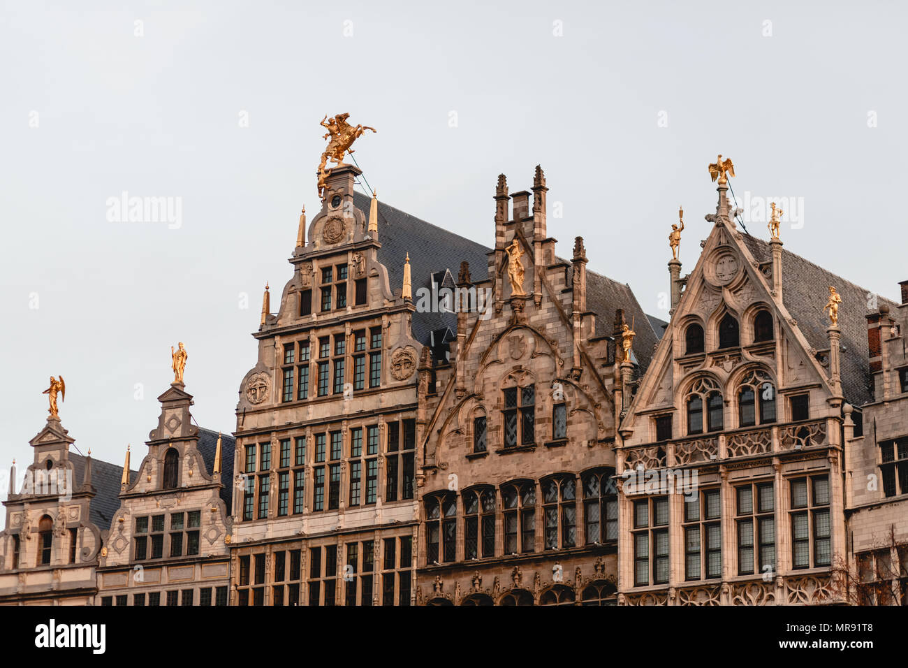 beautiful ancient buildings with sculptures in historical quarter of ...