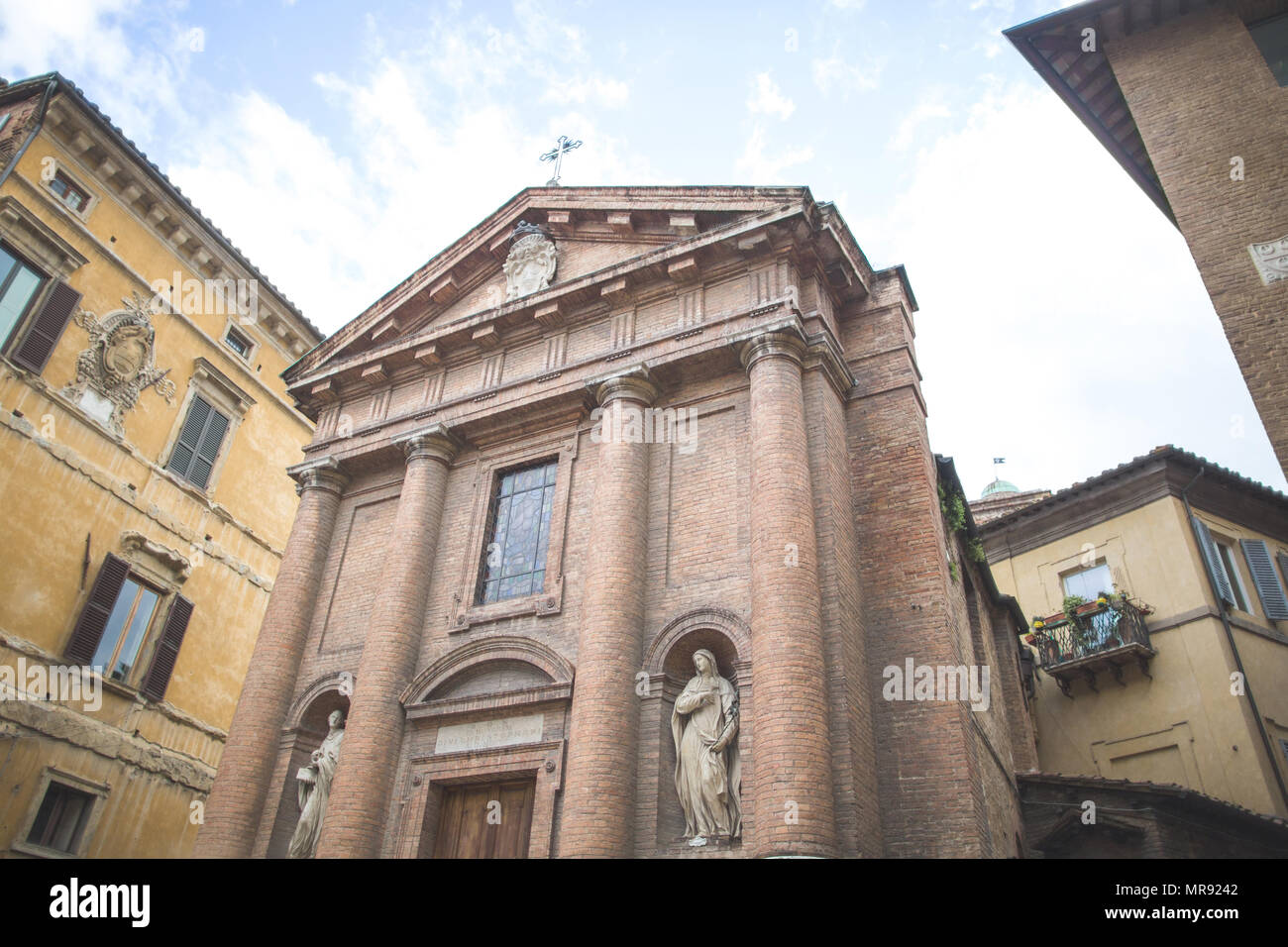 Saint Christopher church facade in Siena Stock Photo - Alamy