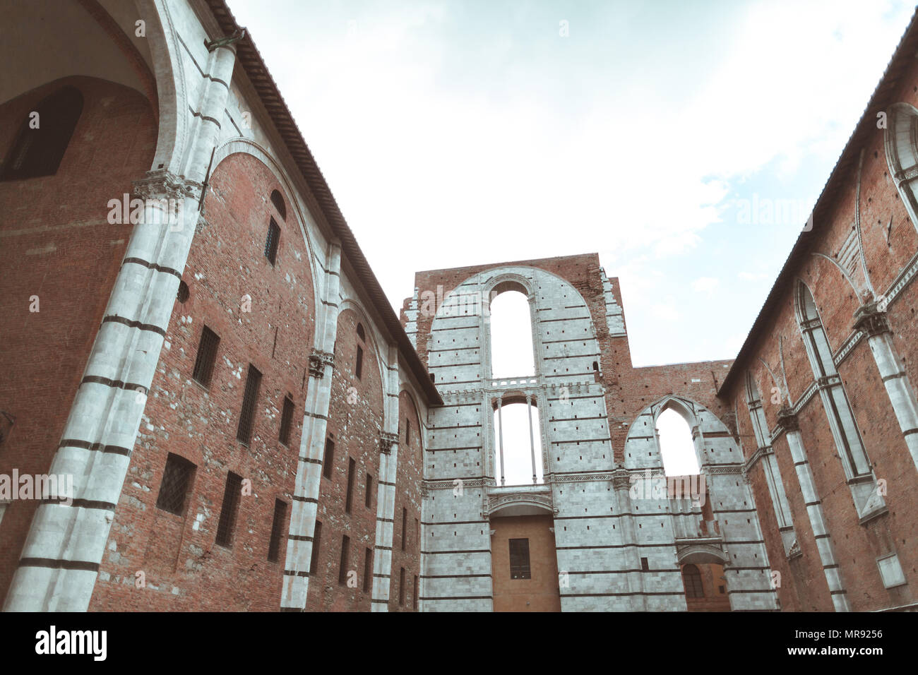 Siena Cathedral brick wall under construction Stock Photo - Alamy