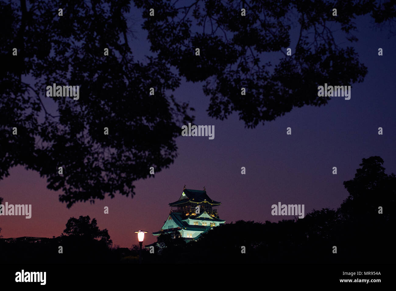 Osaka Castle at Sunset Stock Photo - Alamy