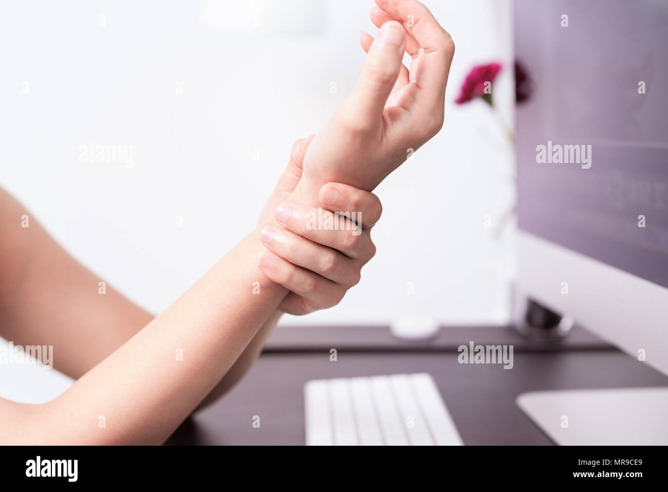 woman wrist arm pain long use mouse at office. office syndrome ...
