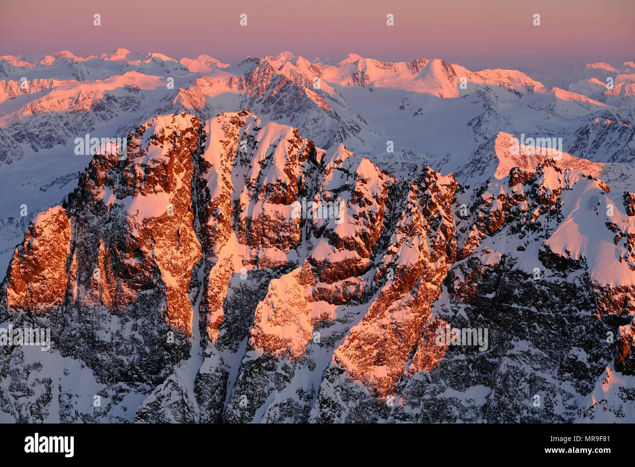 Sunset on the summit ridge of Organ Mountain, Chugach Mountains, Alaska ...