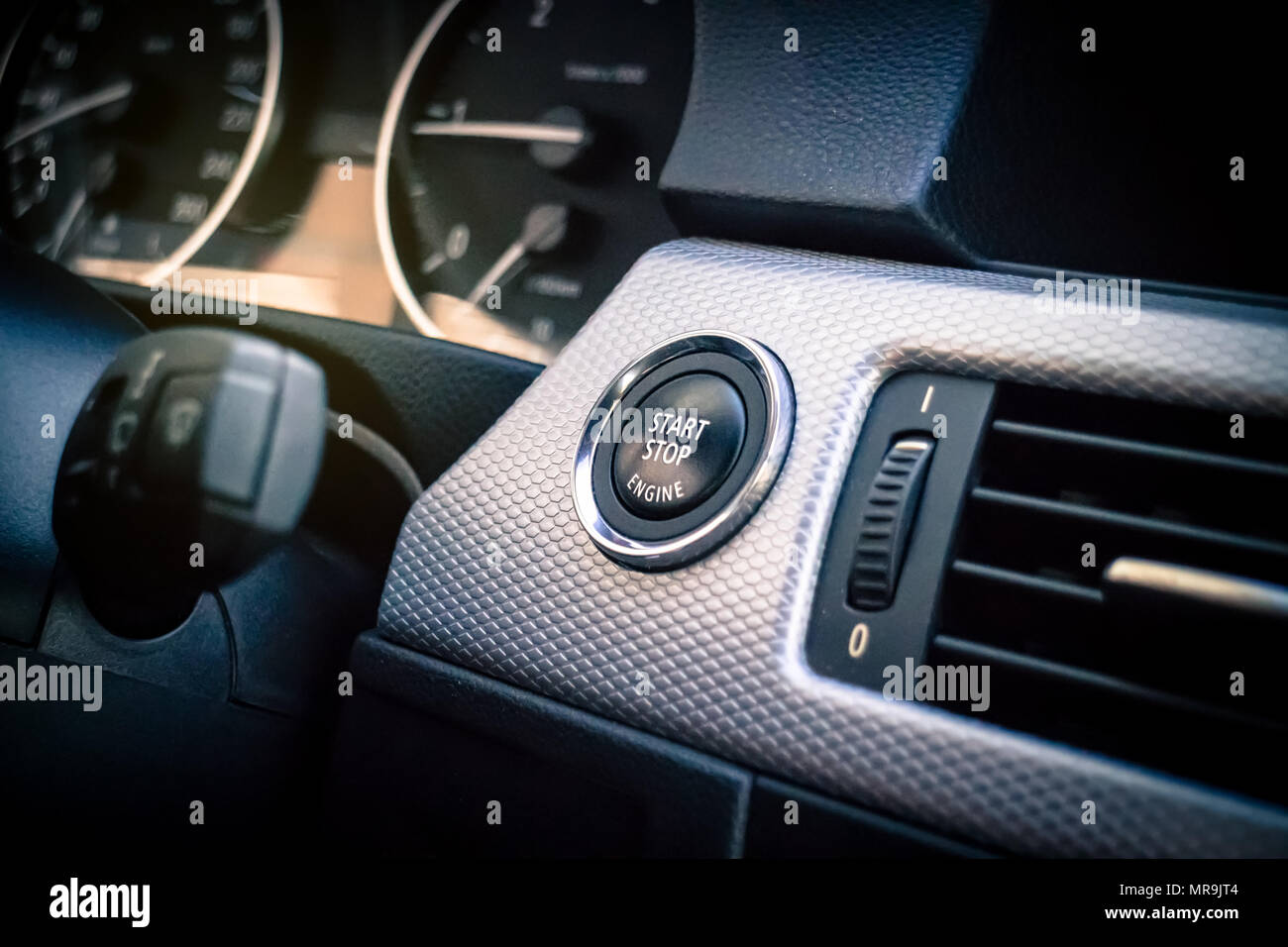 Start and Stop Engine button on modern car dashboard Stock Photo - Alamy