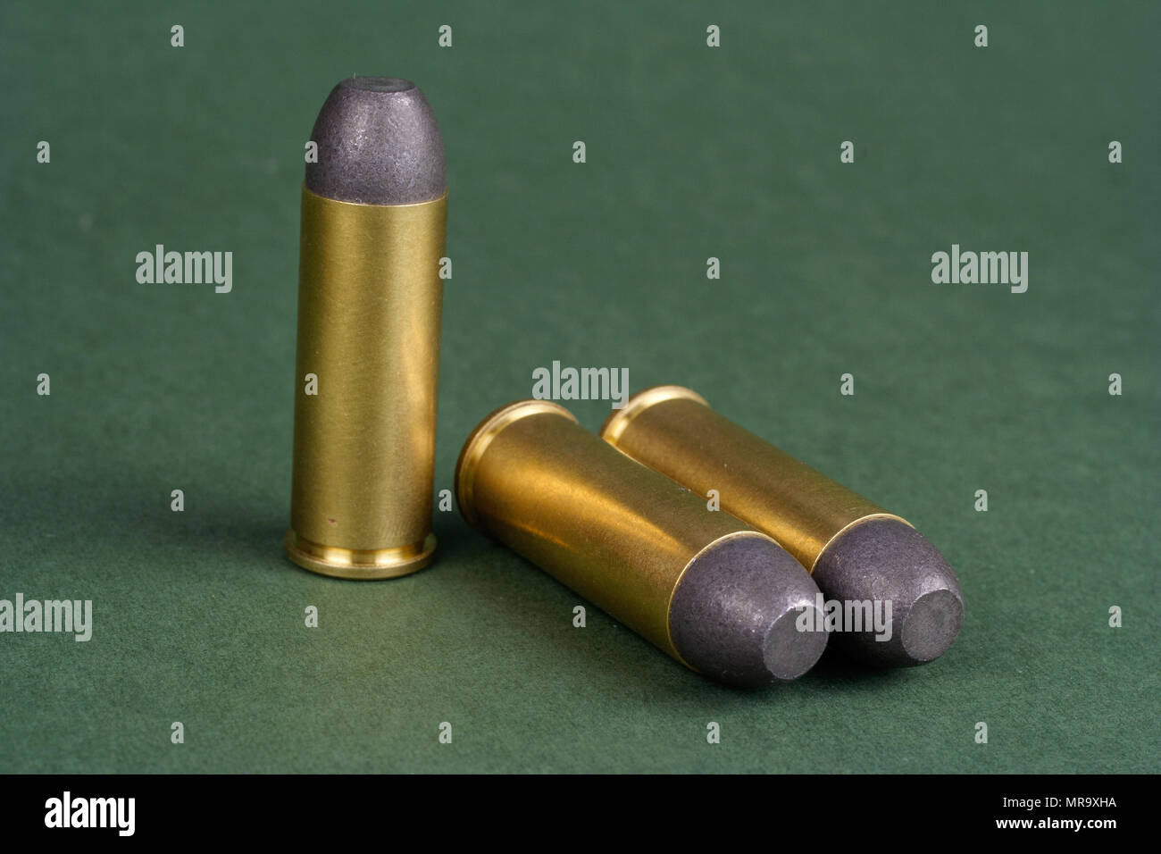 The Wild West period Revolver cartridges dating to 1872 on green ...