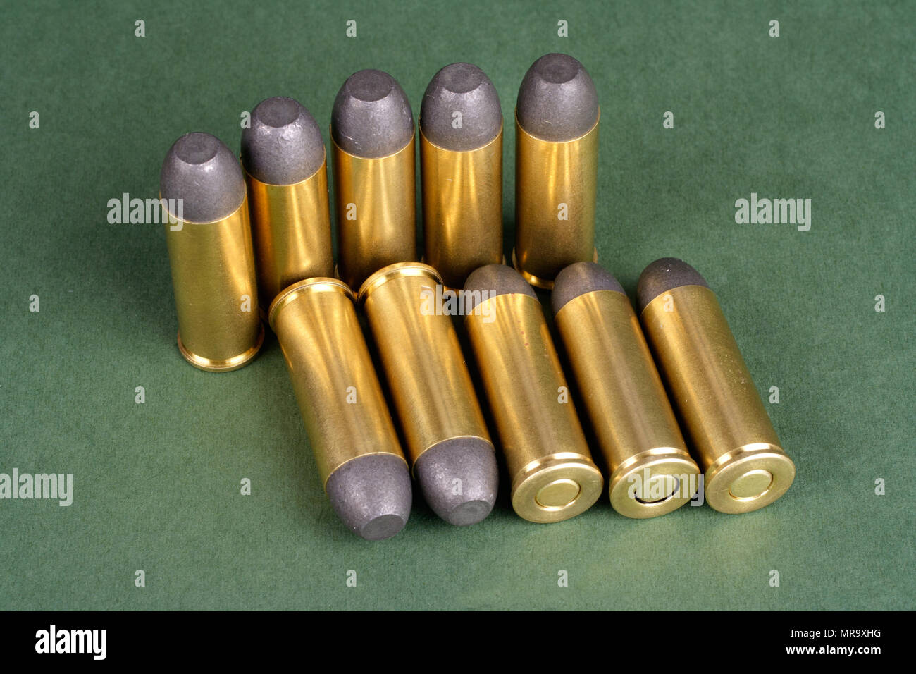 The Wild West period Revolver cartridges dating to 1872 on green ...