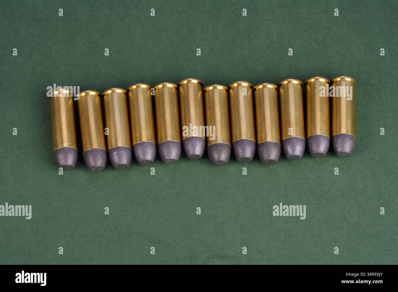 The Wild West period Revolver cartridges dating to 1872 on green ...