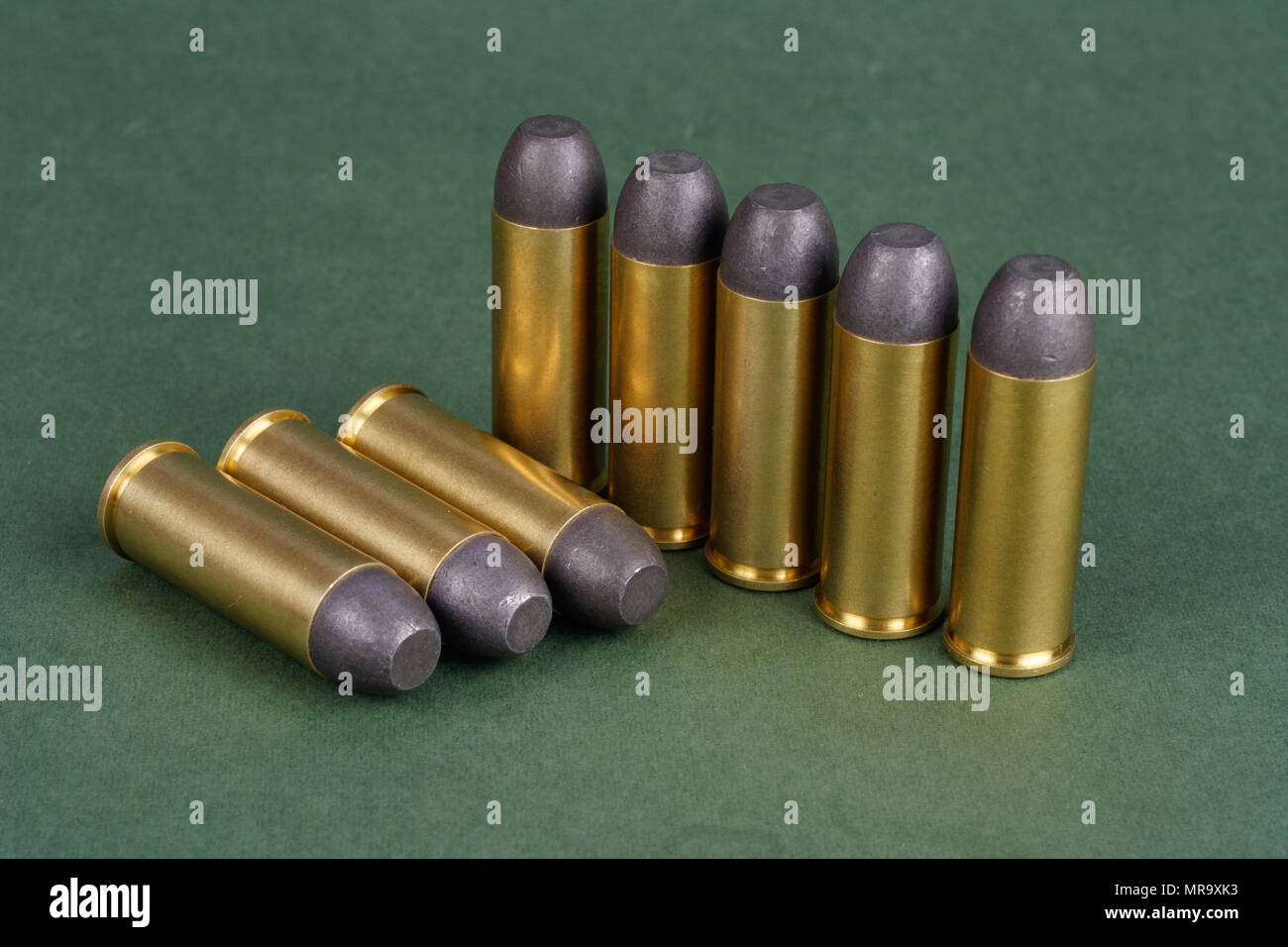 The Wild West period Revolver cartridges dating to 1872 on green ...