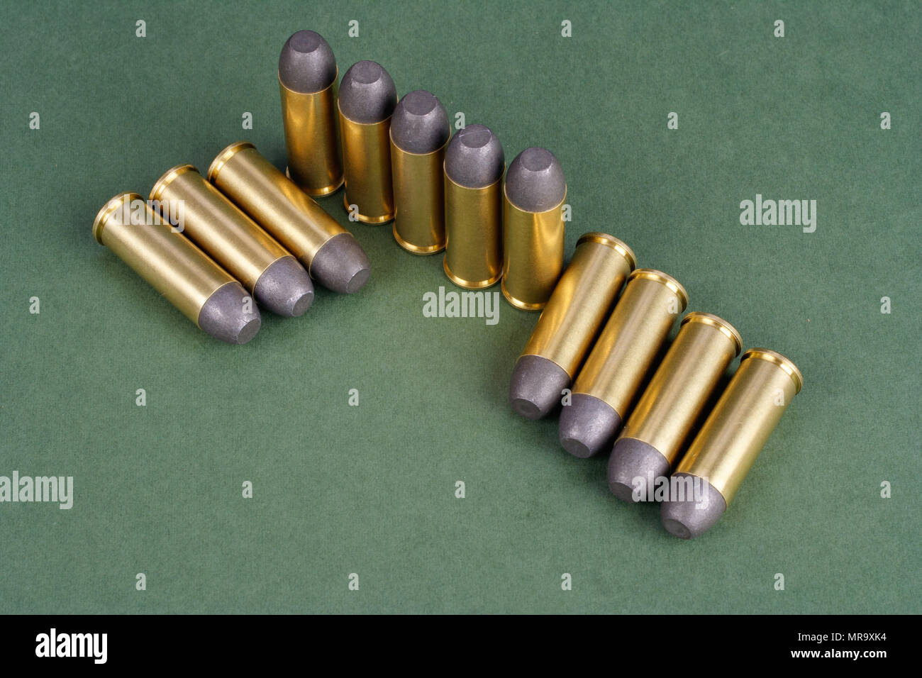 The Wild West period Revolver cartridges dating to 1872 on green ...