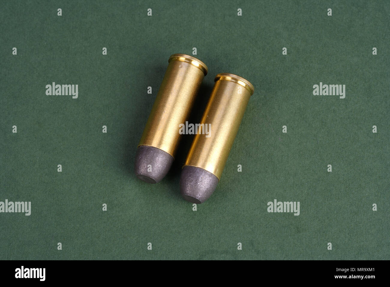 The Wild West period Revolver cartridges dating to 1872 on green ...