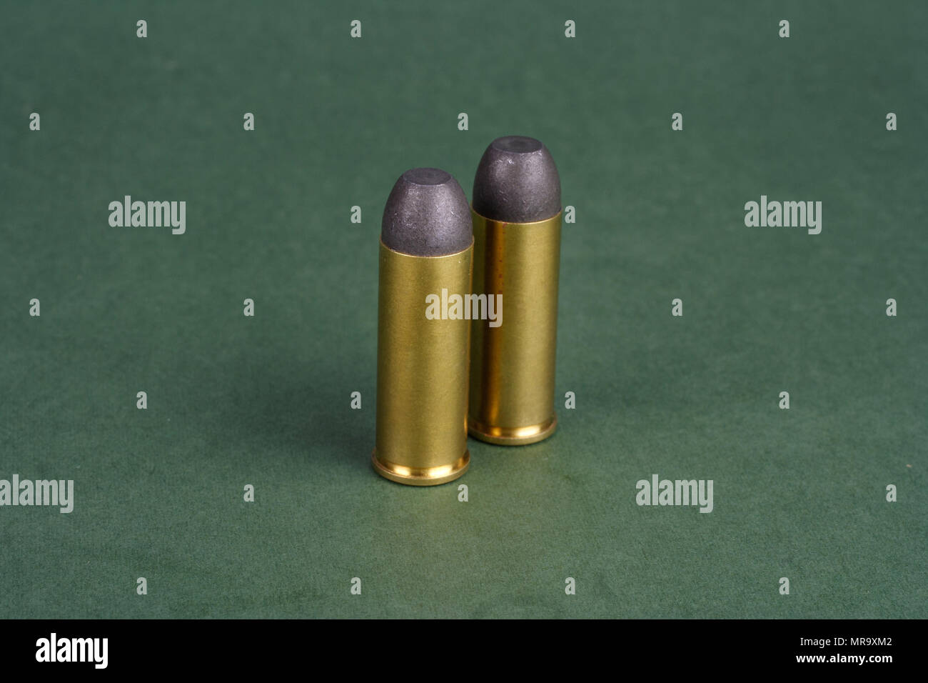 The Wild West period Revolver cartridges dating to 1872 on green ...