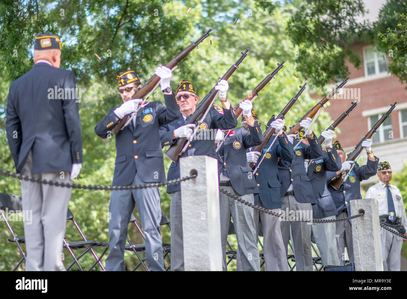 Members of the Marine Corps League Det. 1131 execute a 21-gun salute ...