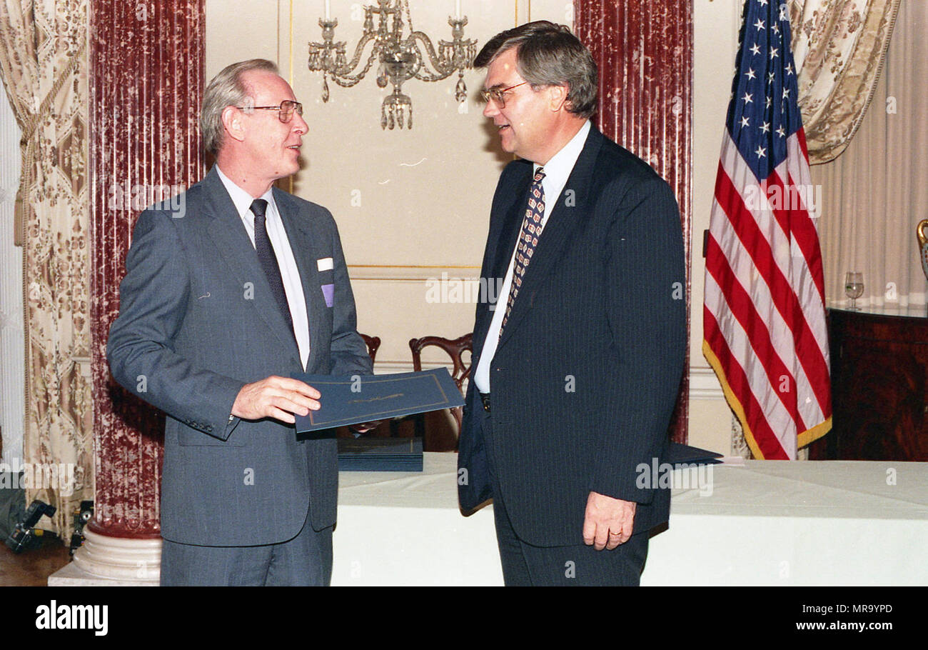 man accepting award taking a picture Stock Photo - Alamy