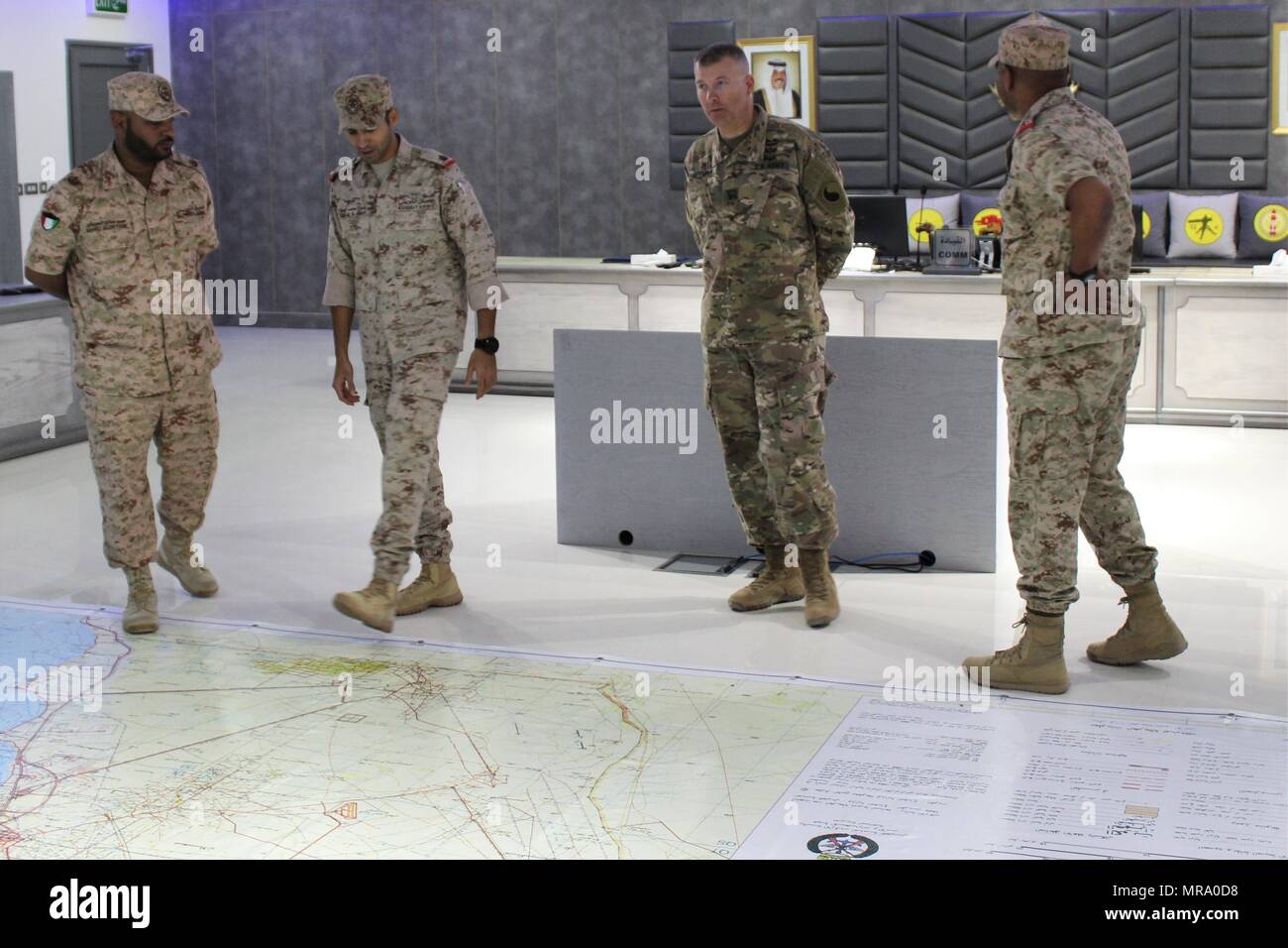 Maj. Hamod and Maj. Sabah brief Brig. Gen. John Epperly, Deputy ...