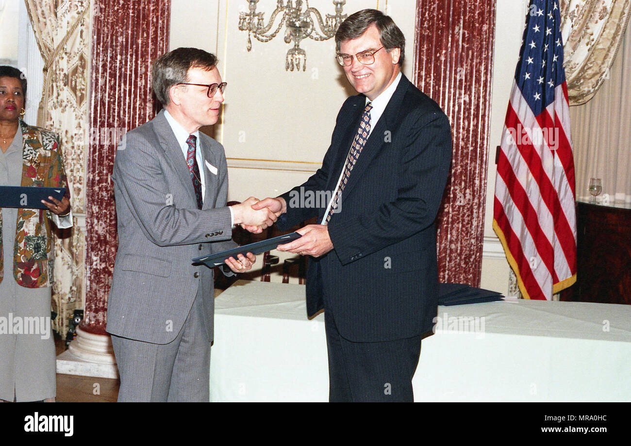 man accepting award taking a picture Stock Photo - Alamy
