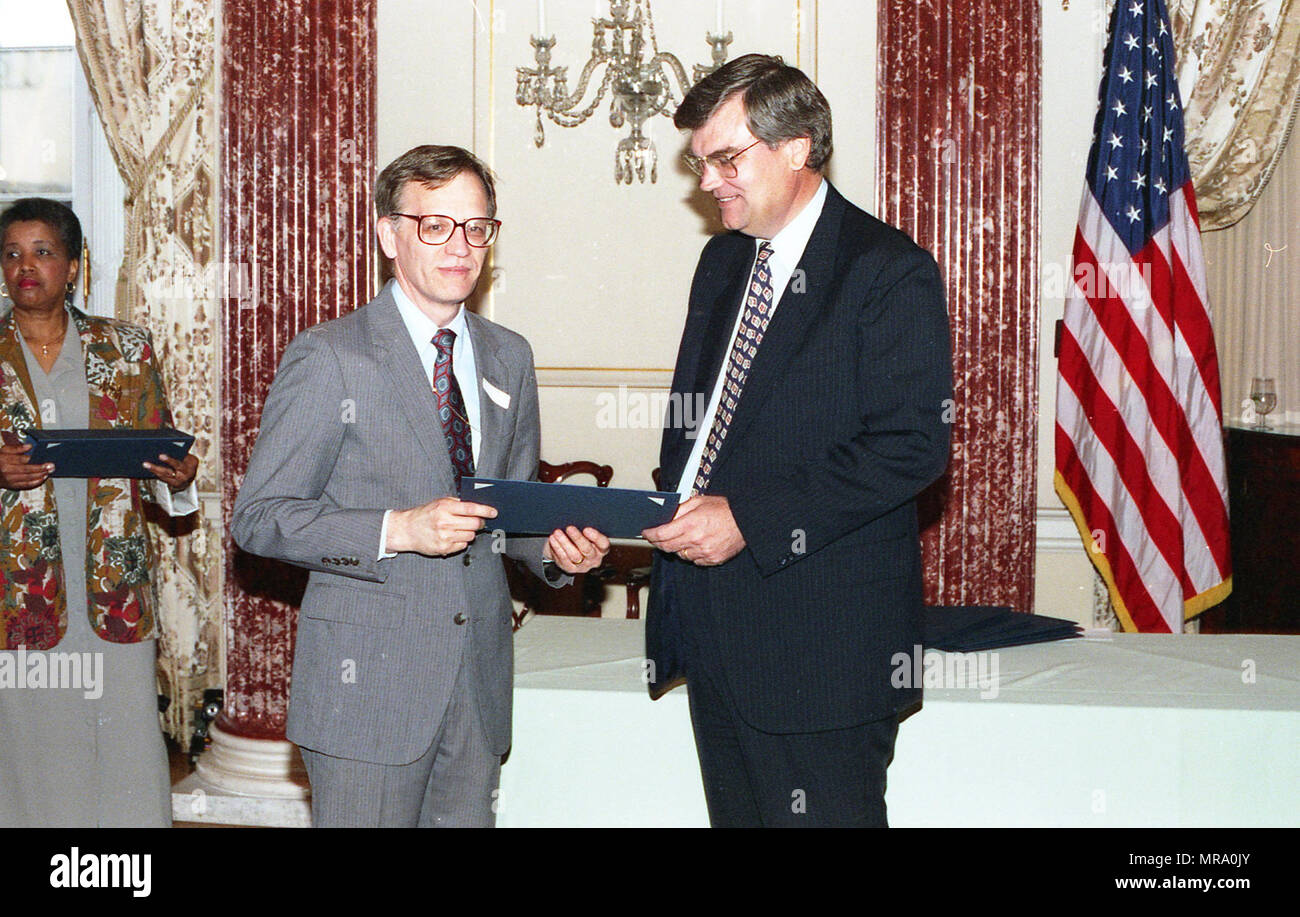 man accepting award taking a picture Stock Photo - Alamy