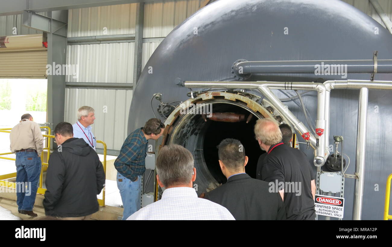 Guests from the 2017 Global Demil Symposium examine LEMC’s ARMD Chamber ...