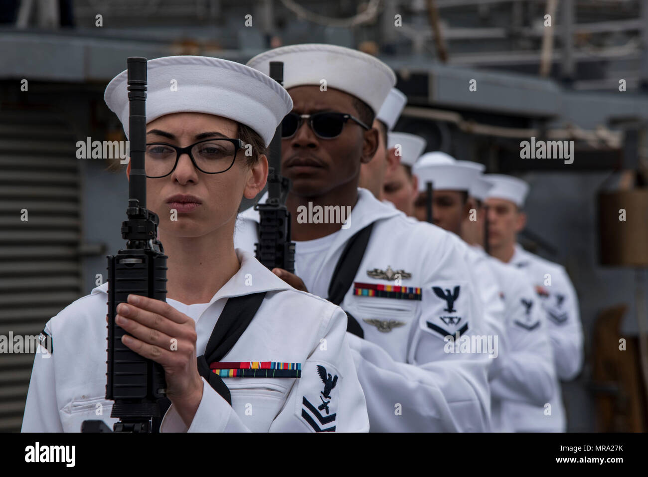 170530-N-QI061-273 ATLANTIC OCEAN (May 30, 2017) Sailors present arms ...